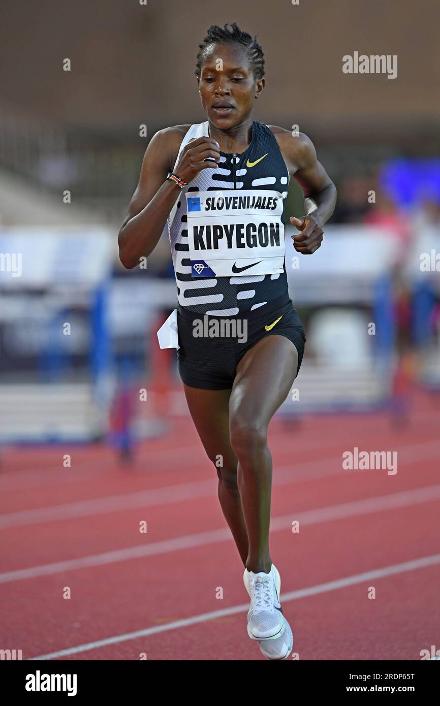 Faith kipyeton ken wins womens mile in world record 4 hi-res stock ...