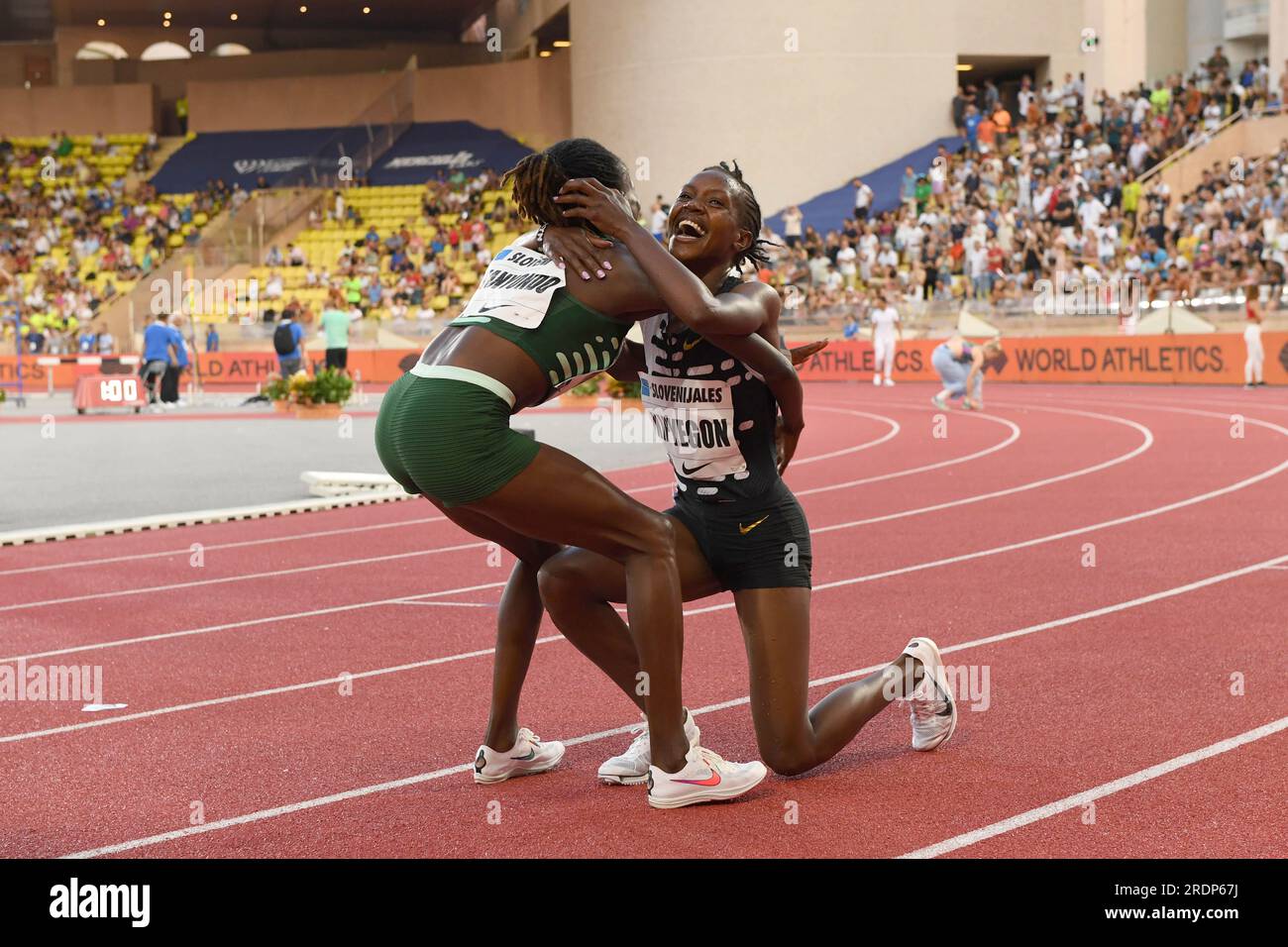 Faith Kipyeton (KEN) celebrates with Winnie Nanyondo (UGA) after ...