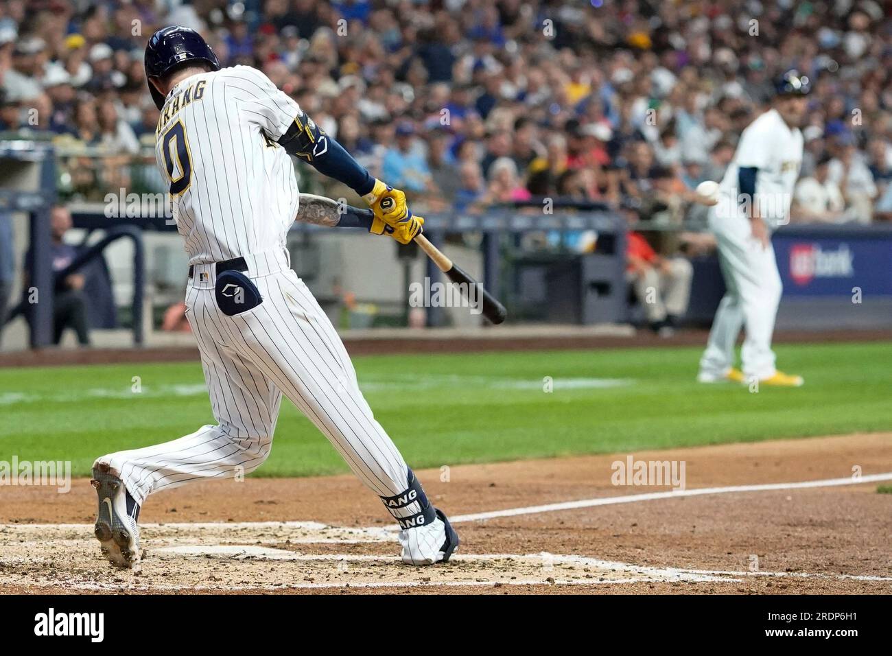 Milwaukee Brewers' Brice Turang hits an RBI sacrifice fly during the ...