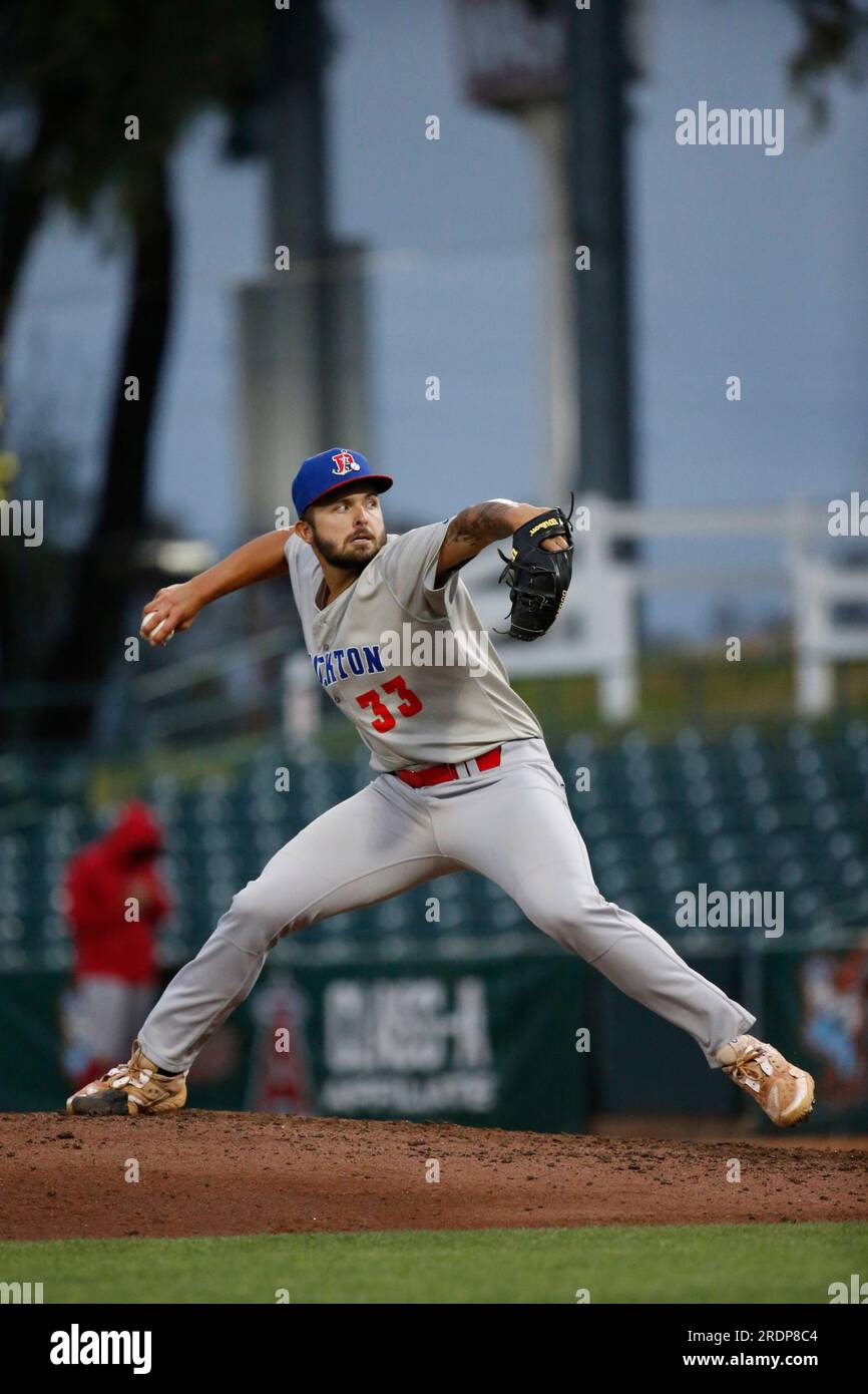 Dallas Woofolk (33) of the Stockton Ports pitches against the Inland ...