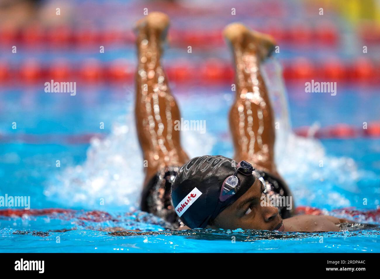 Lamar Taylor of Bahamas watches the score board of Men 50m Butterfly heat at the World Swimming ...
