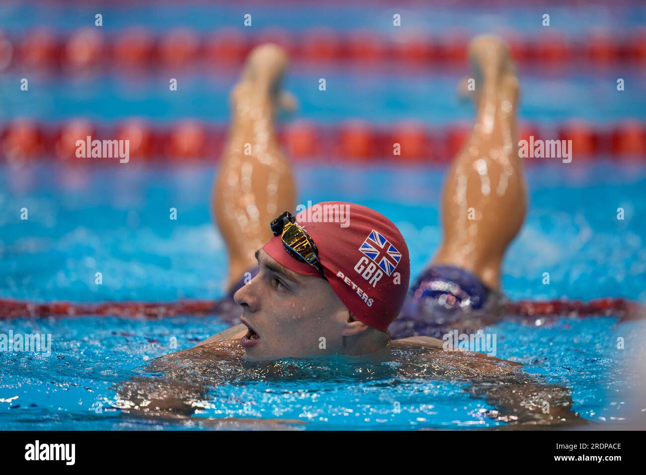 Jacob Thomas Taylor Peters of Great Britain watches his timings after ...