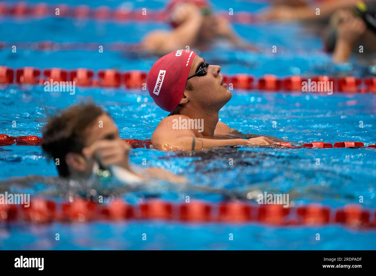 Jacob Thomas Taylor Peters of Great Britain watches his timings after ...