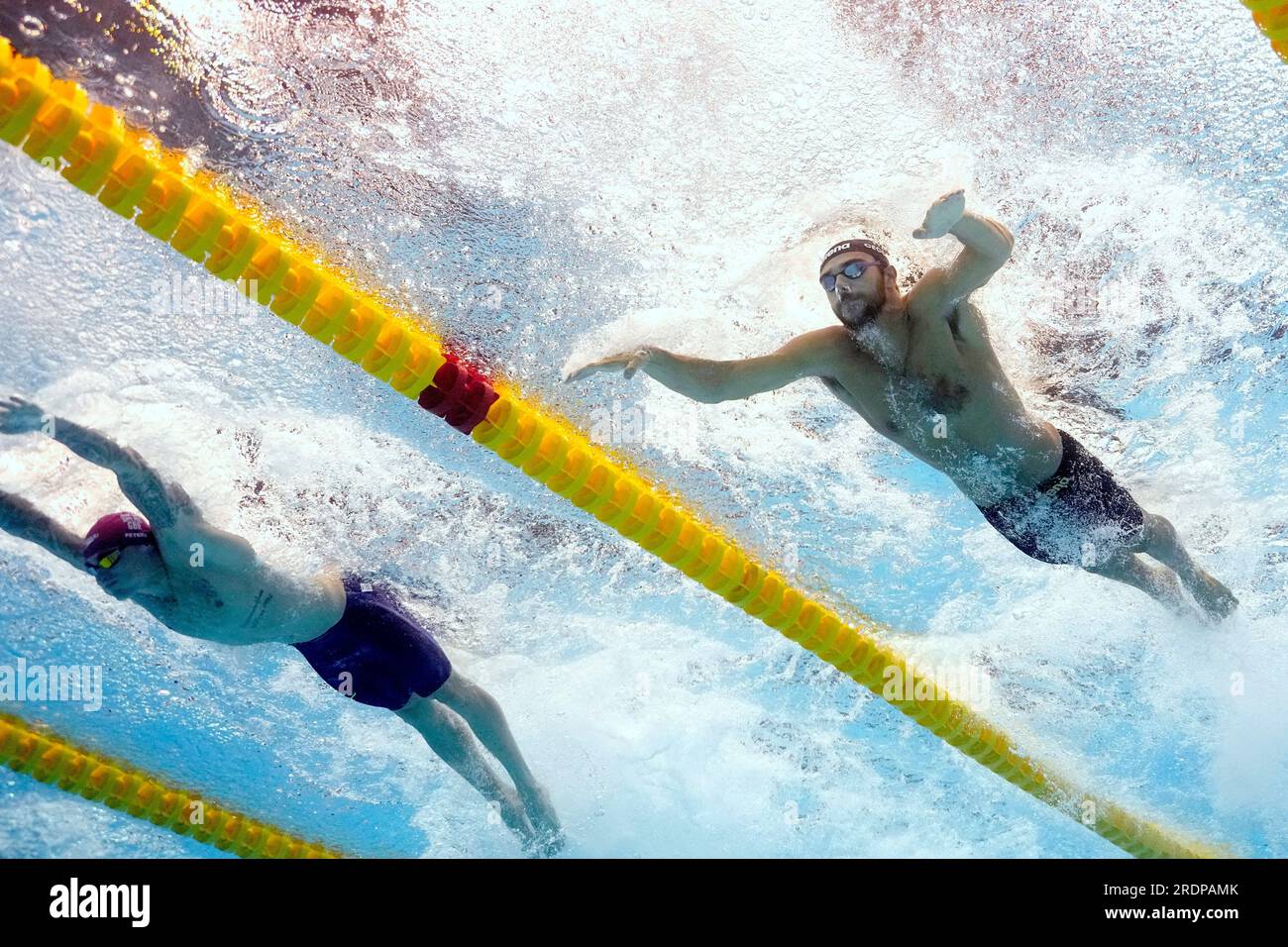 Thomas Ceccon, of Italy, competes in the men's 50m butterfly at the ...