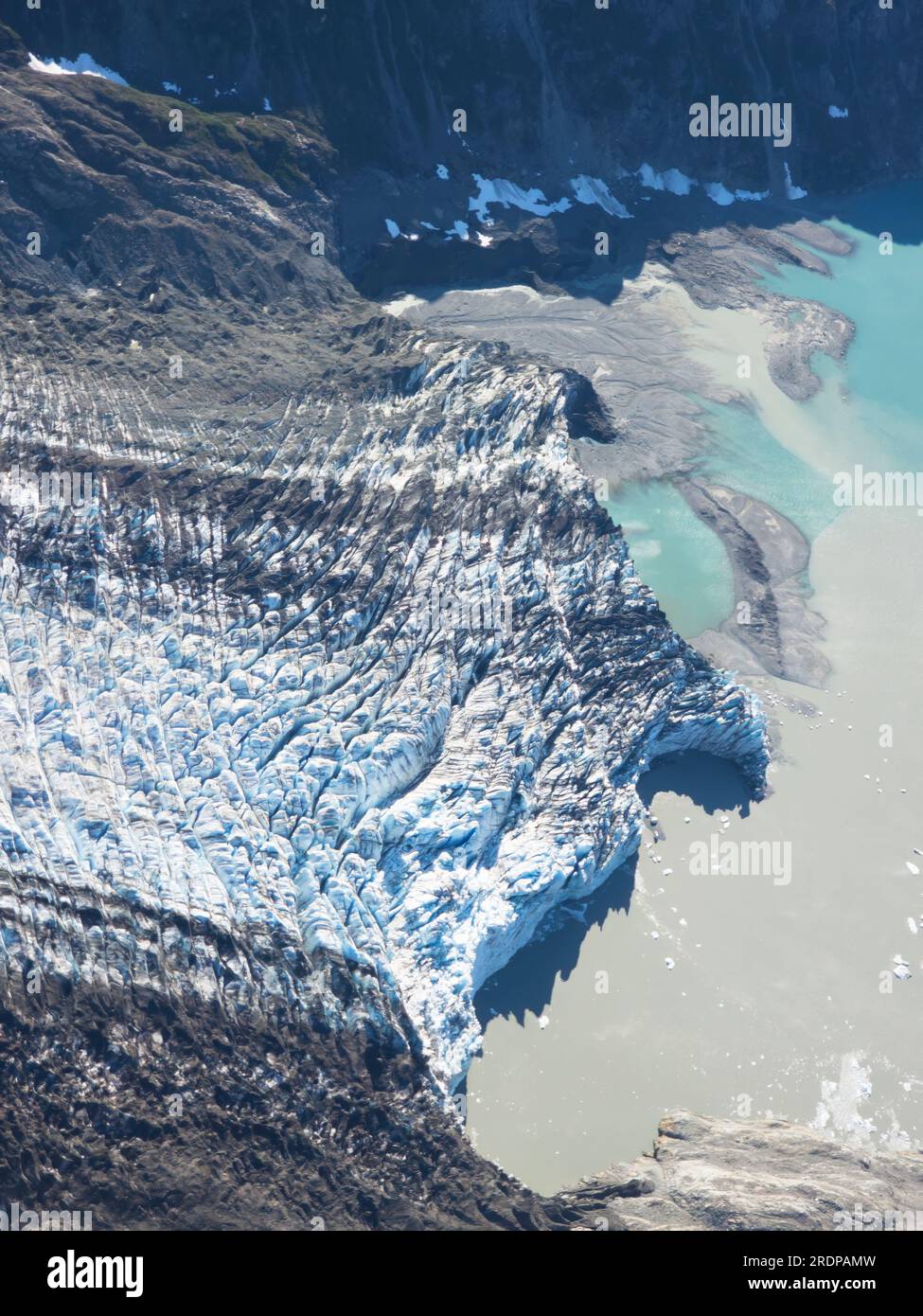 Aerial of melting glacier with silt in Alaska in summer Stock Photo - Alamy