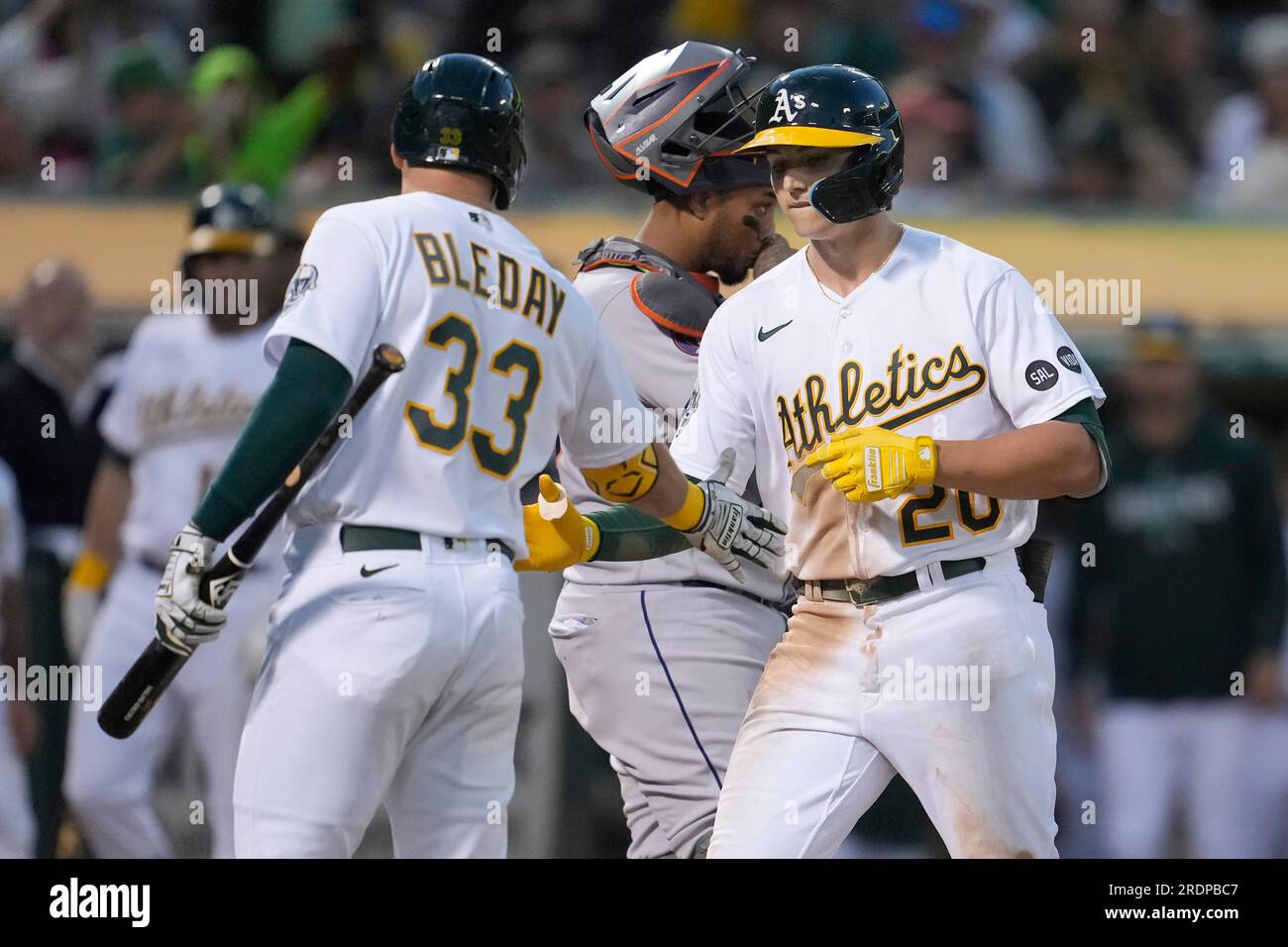 Oakland Athletics' Zack Gelof, right, is congratulated by JJ Bleday (33 ...