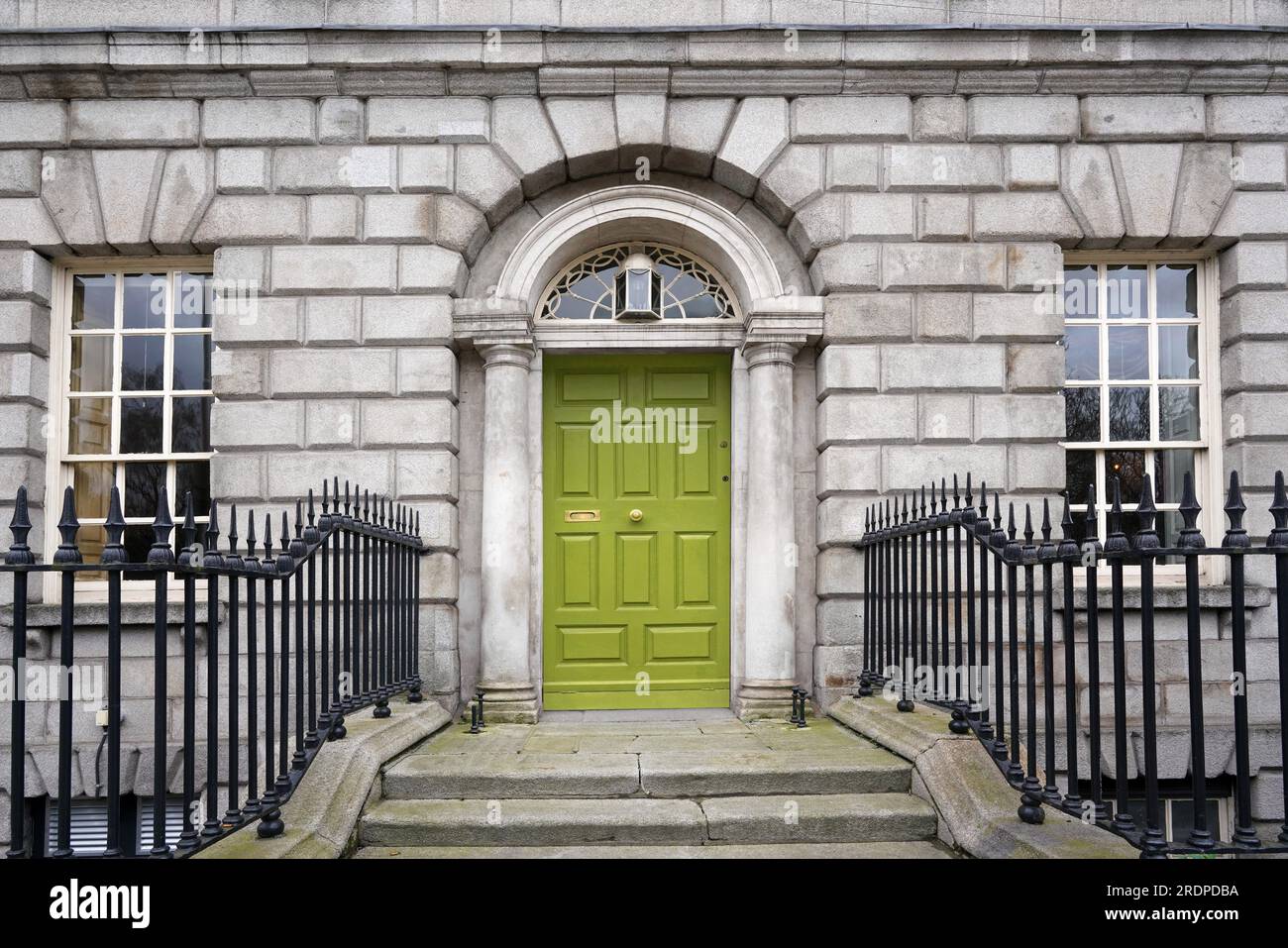 Front door of old stone office building Stock Photo - Alamy