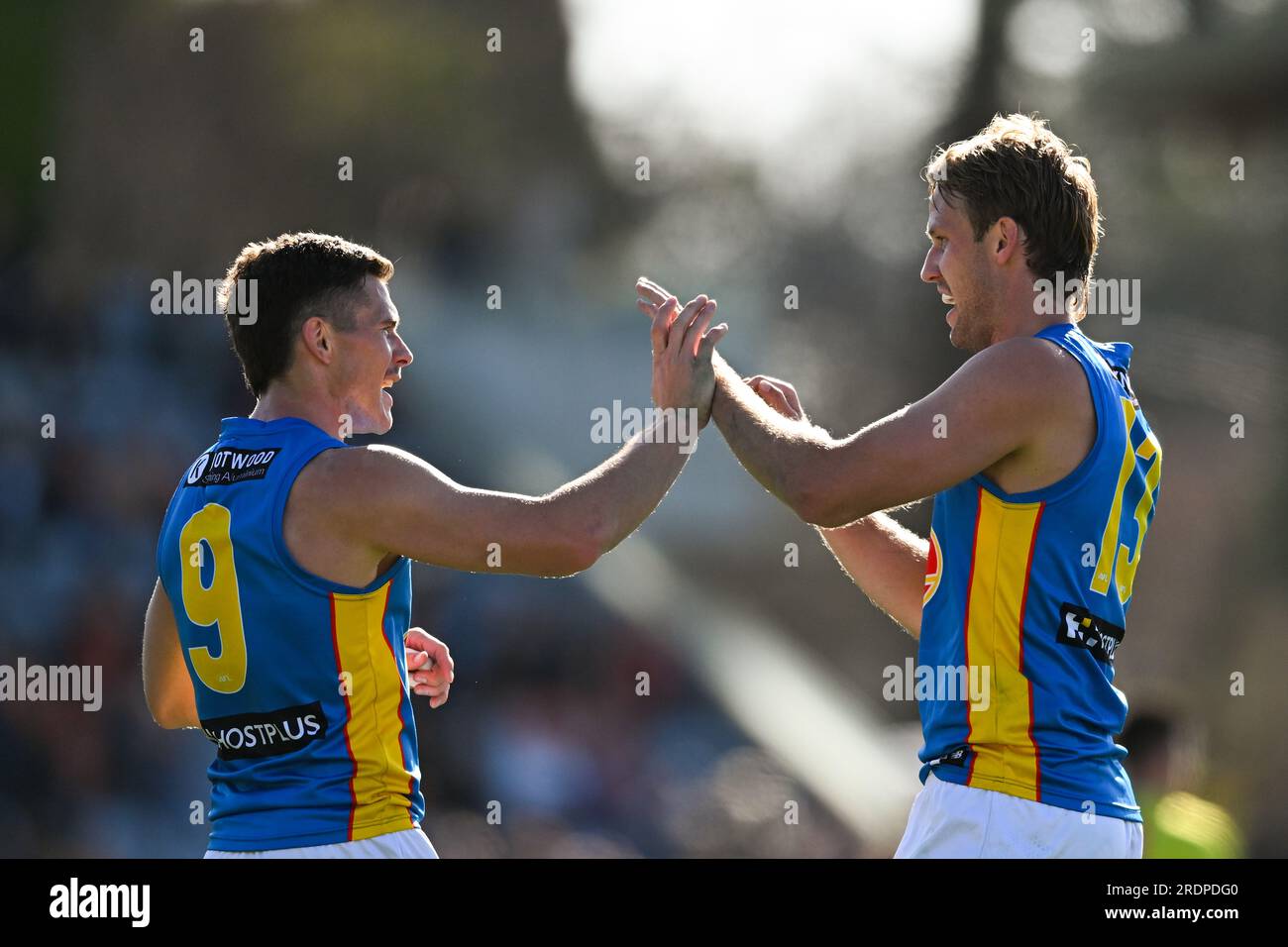 Canberra, Australia. 23rd July, 2023. Jack Lukosius of the Suns (right ...