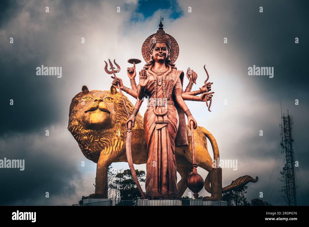 Asian Hindu statue in Mauritius and Bali. Gods temple and water ...