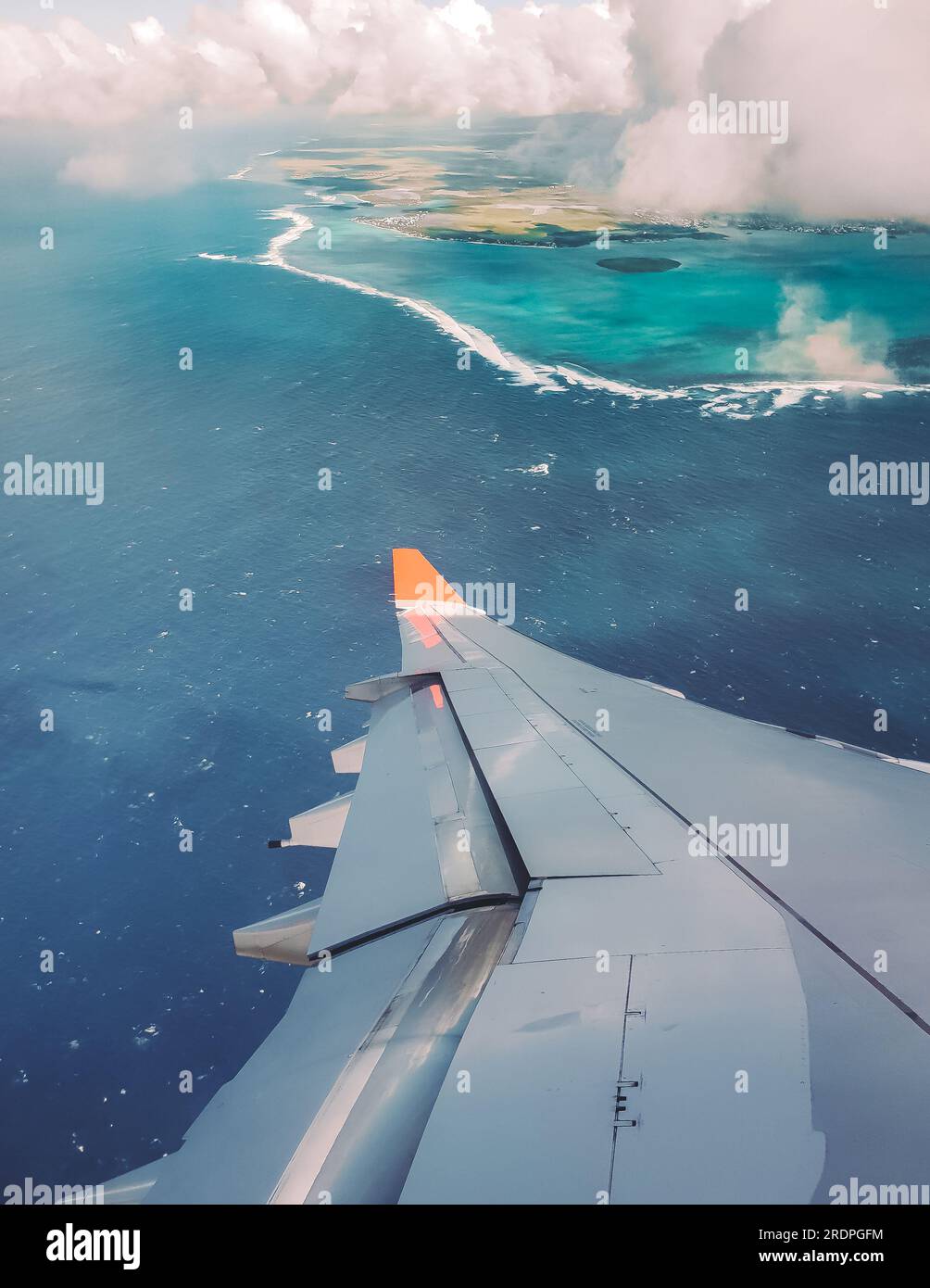 Airplane view from the window on the coast of Mauritius. Take off from ...