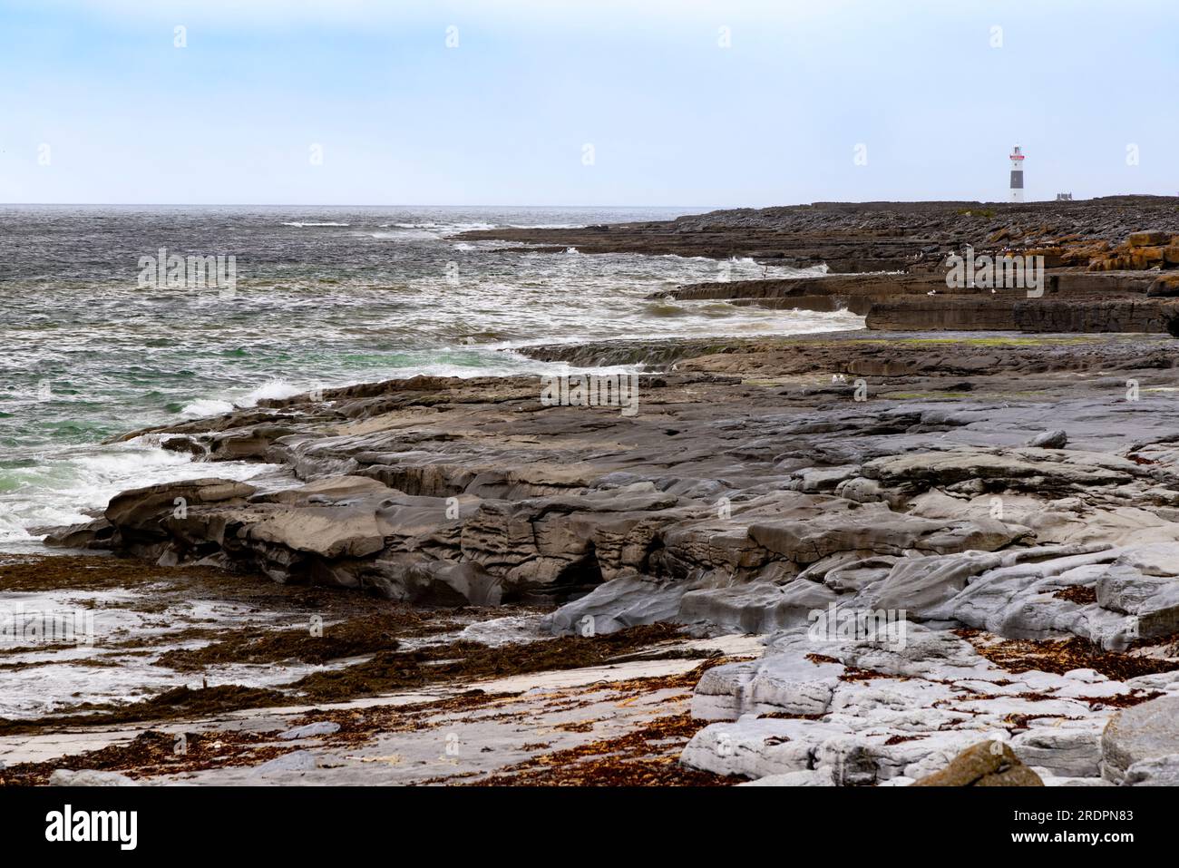 Inis Oirr or Inisheer lighthouse located on the southeastern point of ...