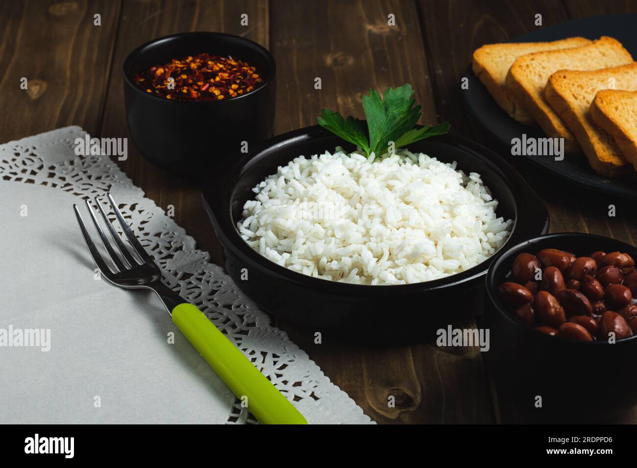 Dominican food with white rice and varius spices Stock Photo - Alamy