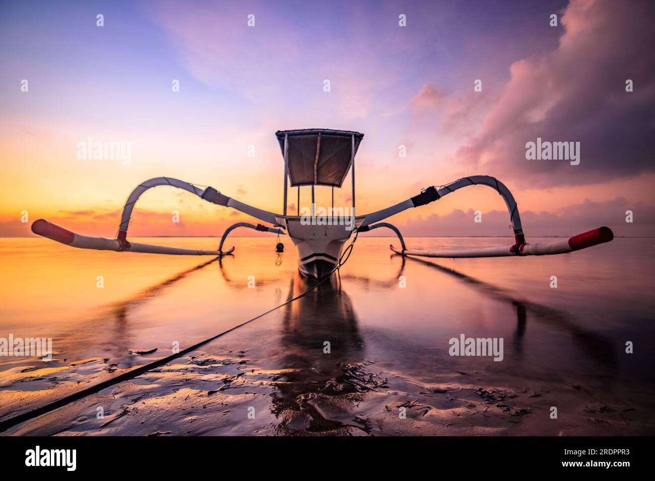 Bali Sanur, traditional fishing boat in sunrise. Close-up in the ...