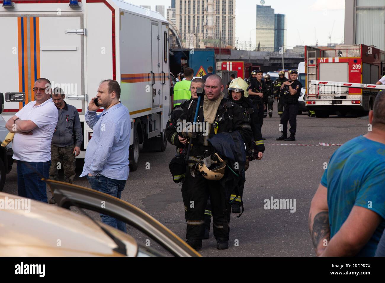 Moscow, Russia. 22nd July, 2023. Rescuers are seen outside a shopping ...
