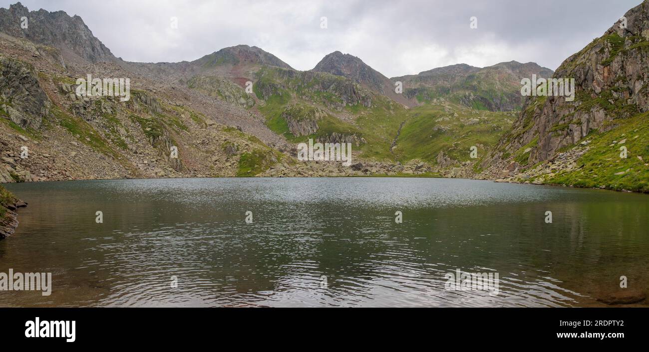 Lake Toma, Oberalp, hiking in Swiss mountains (view to the source of ...