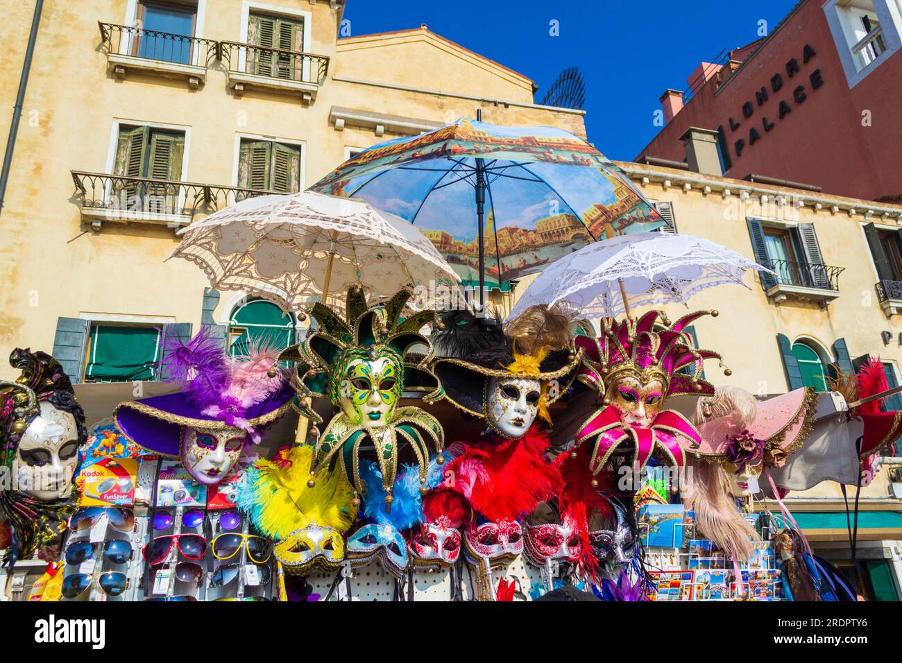 Beautiful carnival masks in variety of colours displayed on vendor ...