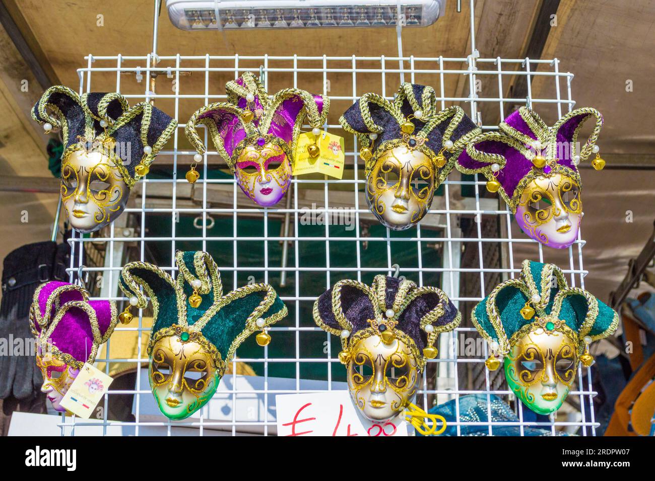 :Beautiful carnival masks in variety of colours displayed on vendor ...