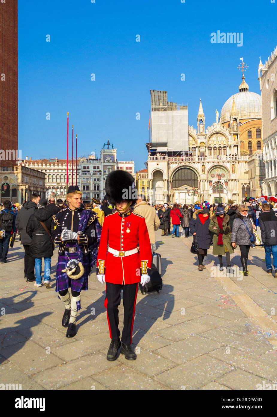 Spectacular costumes of disguised people and tourists having fun at ...