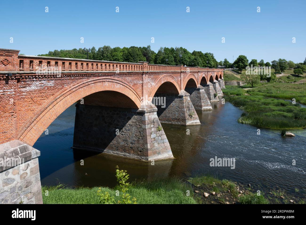 The Old Brick Bridge in across the Venta river is the longest bridge of ...