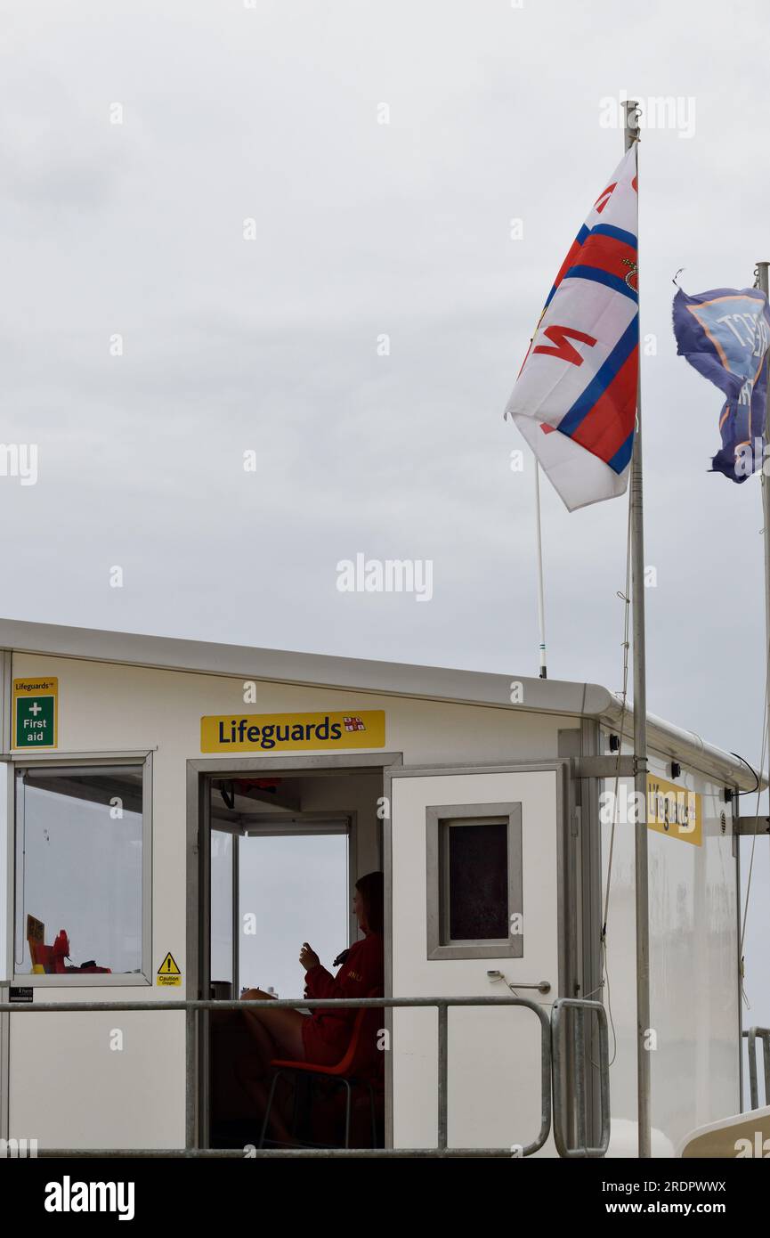 RNLI Watchtower with Lifeguard Lyme Regis looking across Lyme Bay ...