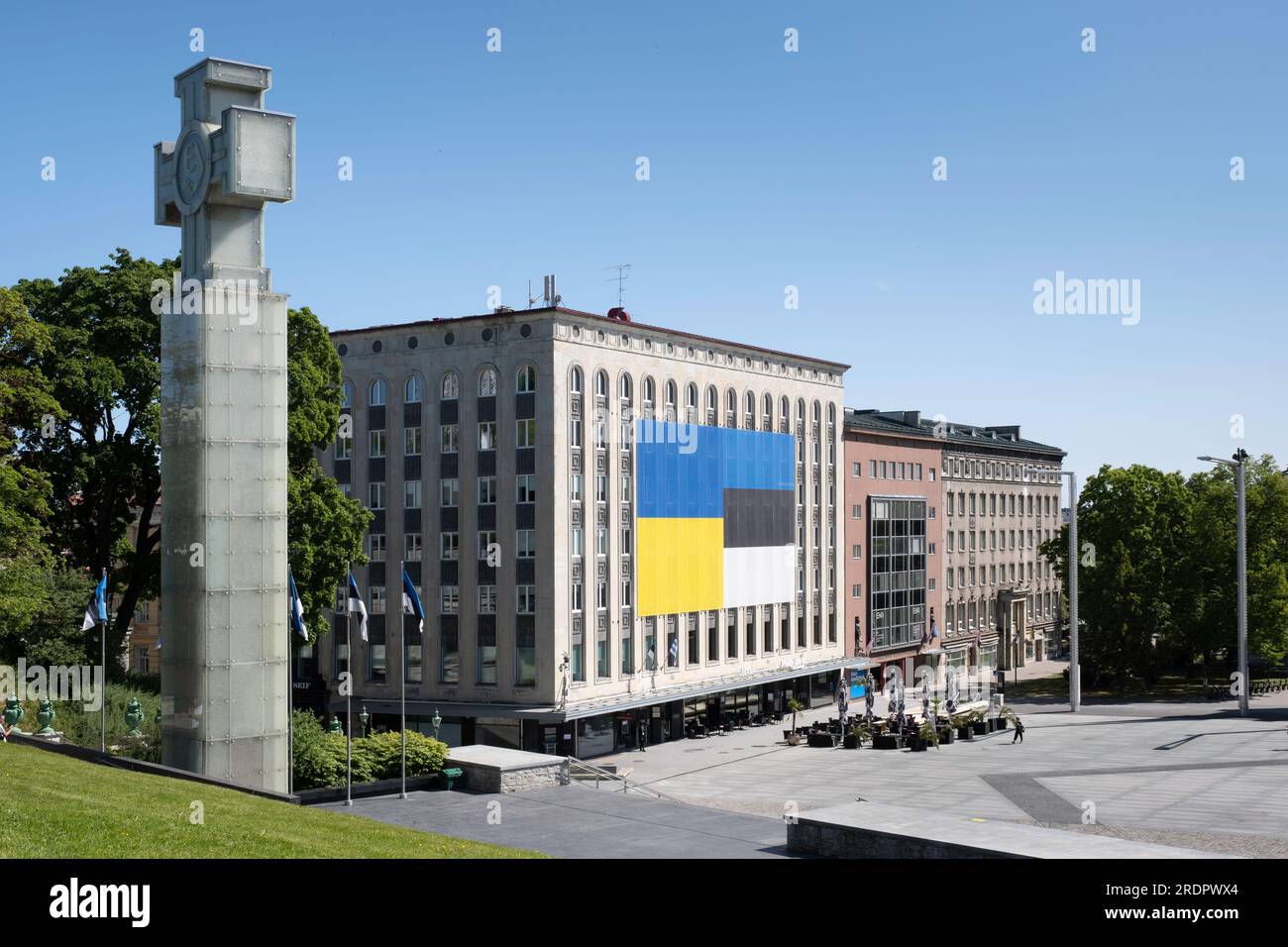 Huge yellow blue flag of Ukraine on the facade of a building on the ...