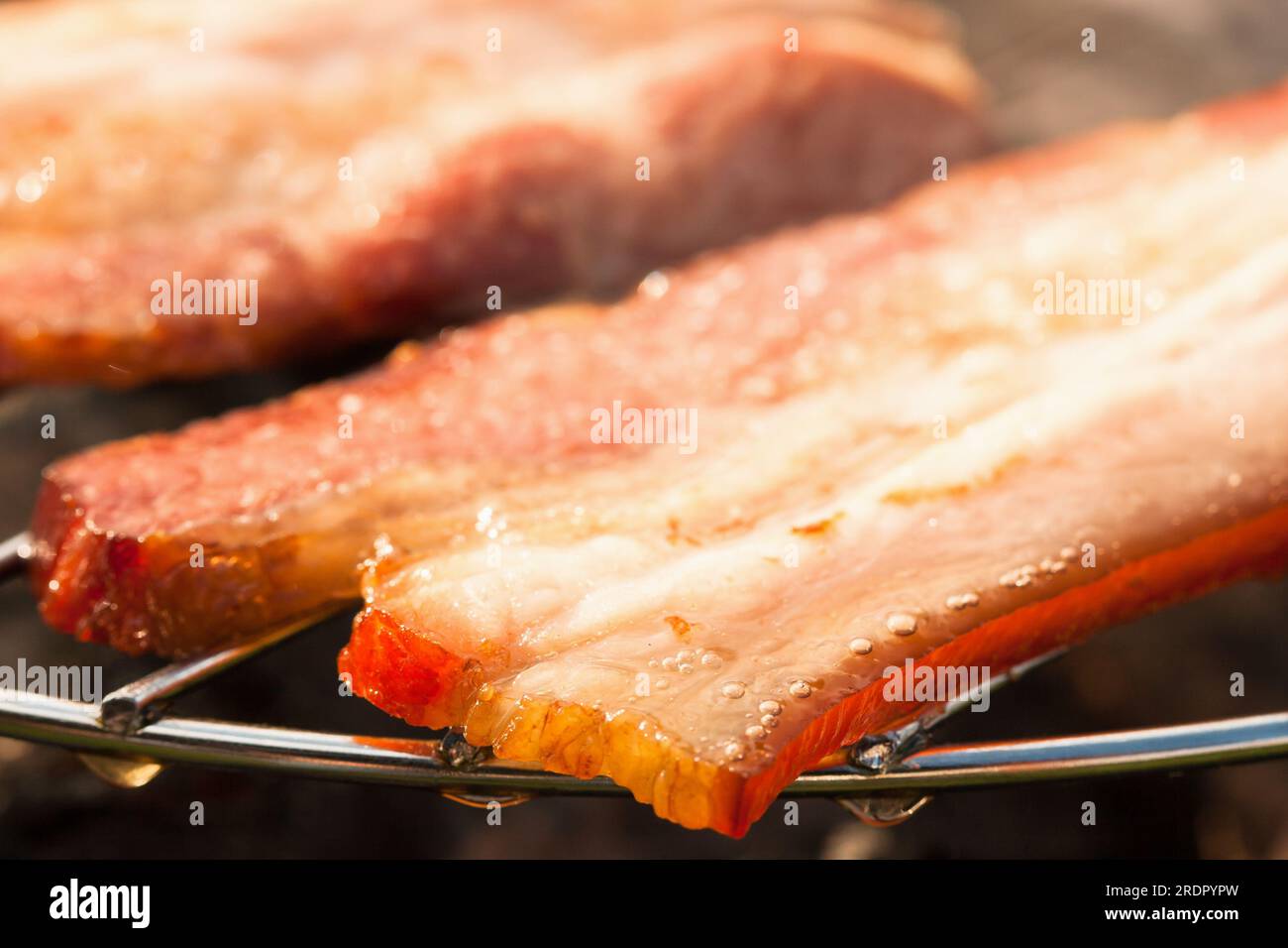 Crispy bacon cooking closeup hi-res stock photography and images - Alamy
