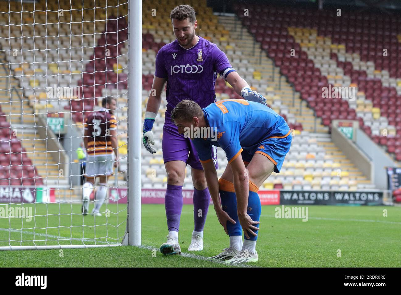 Harry Lewis #1 of Bradford City taps Liam Delap #20 of Hull City on the ...