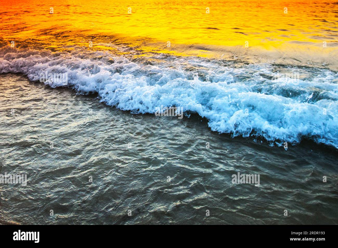 Beautiful surf wave with reflection of beautiful sunset sky Stock Photo ...