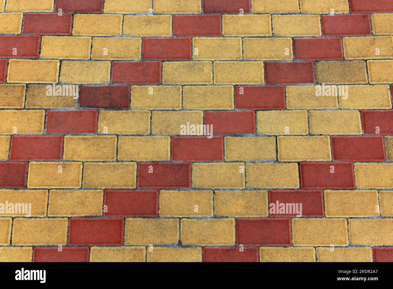 Image background of laid street parquet in yellow and red Stock Photo ...