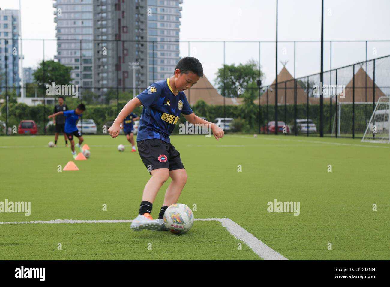 Chengdu, China's Sichuan Province. 21st July, 2023. Boys attend a ...