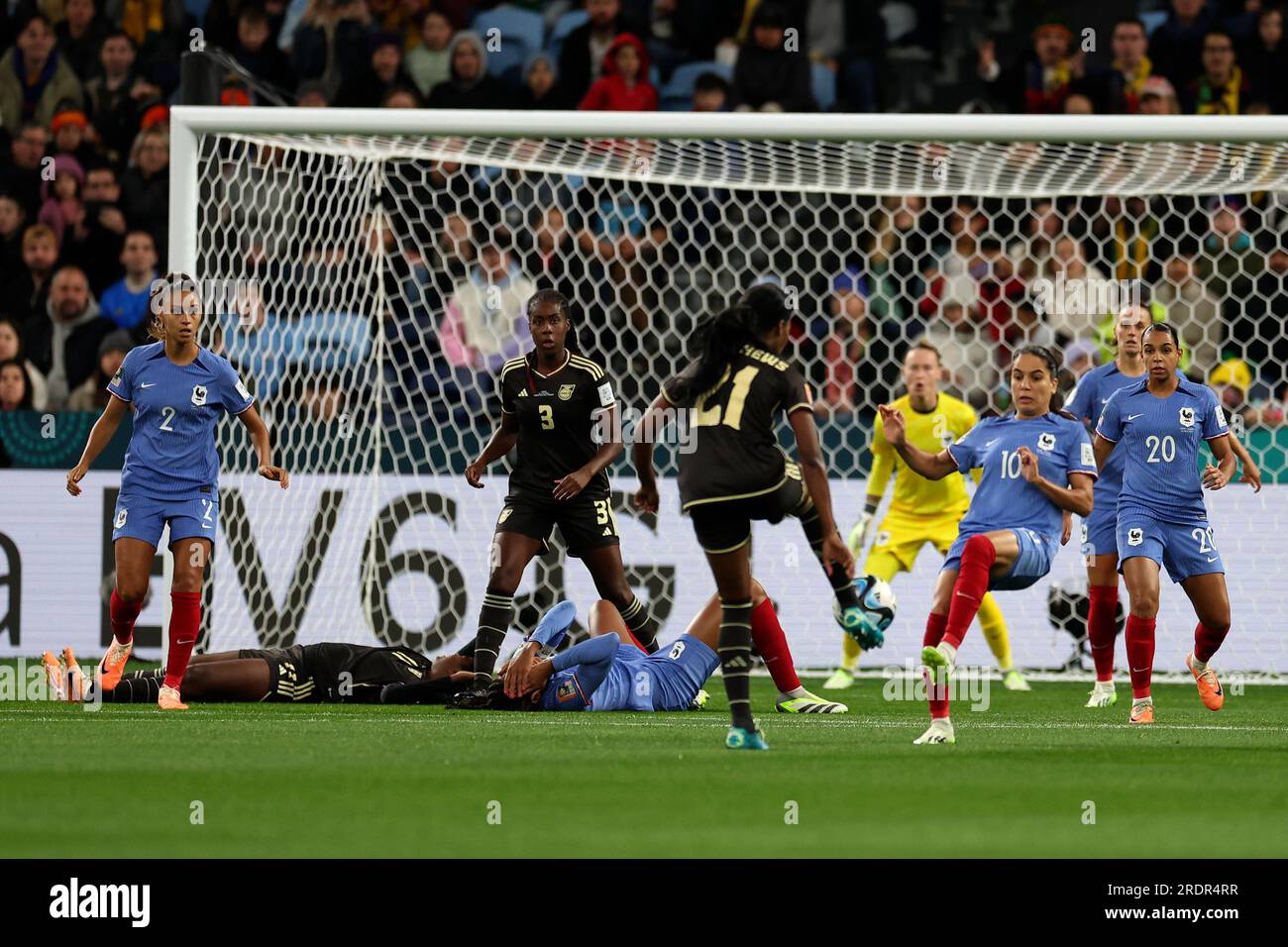 Jamaica's Khadija Shaw and France's Wendie Renard lie on the ground ...