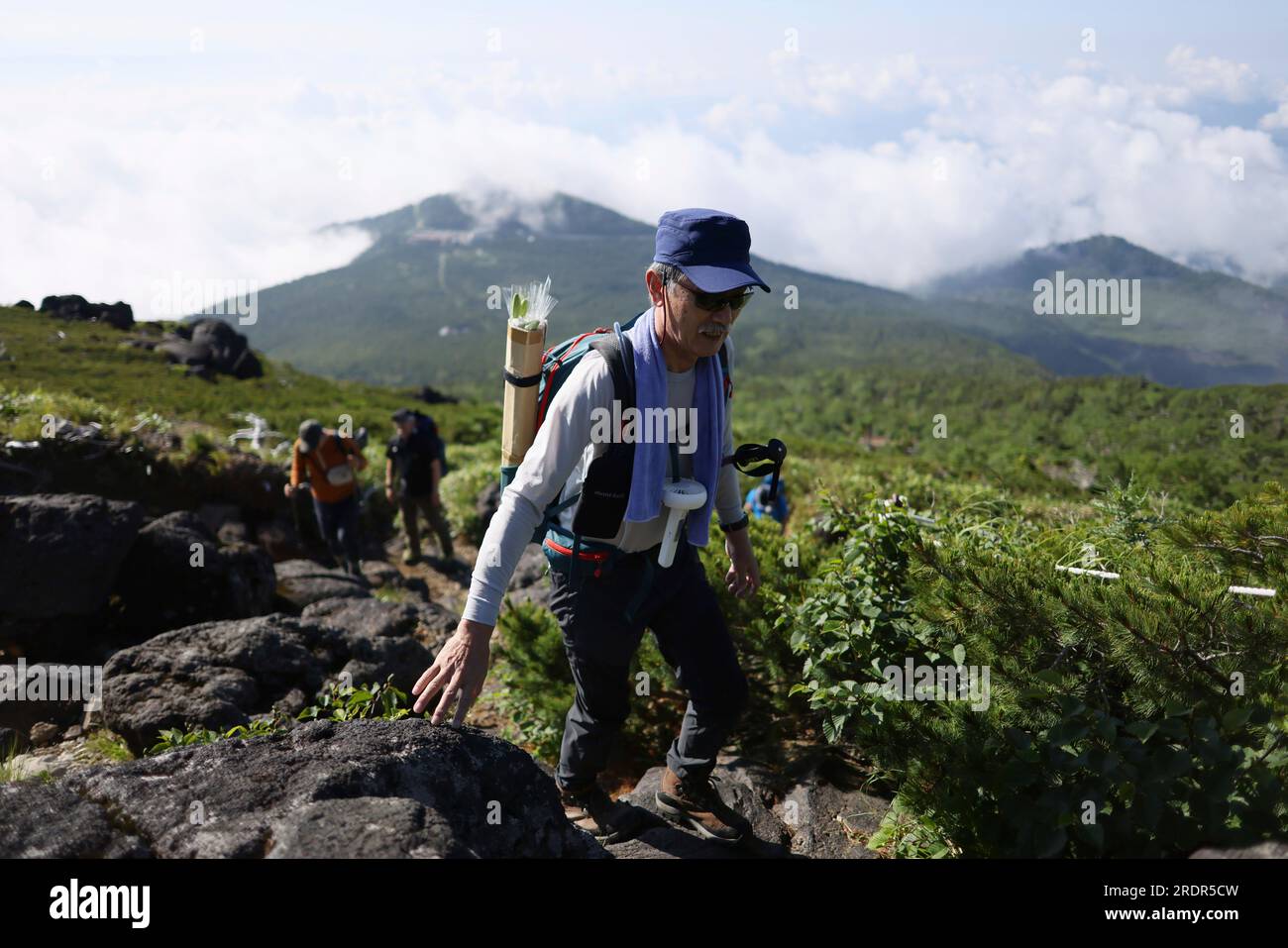 Bereaved families climb Mount Ontake (3067m) to console the spirits of ...