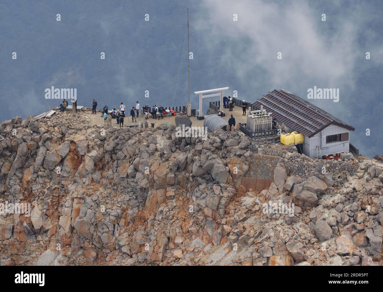 Bereaved families climb Mount Ontake (3067m) to console the spirits of ...