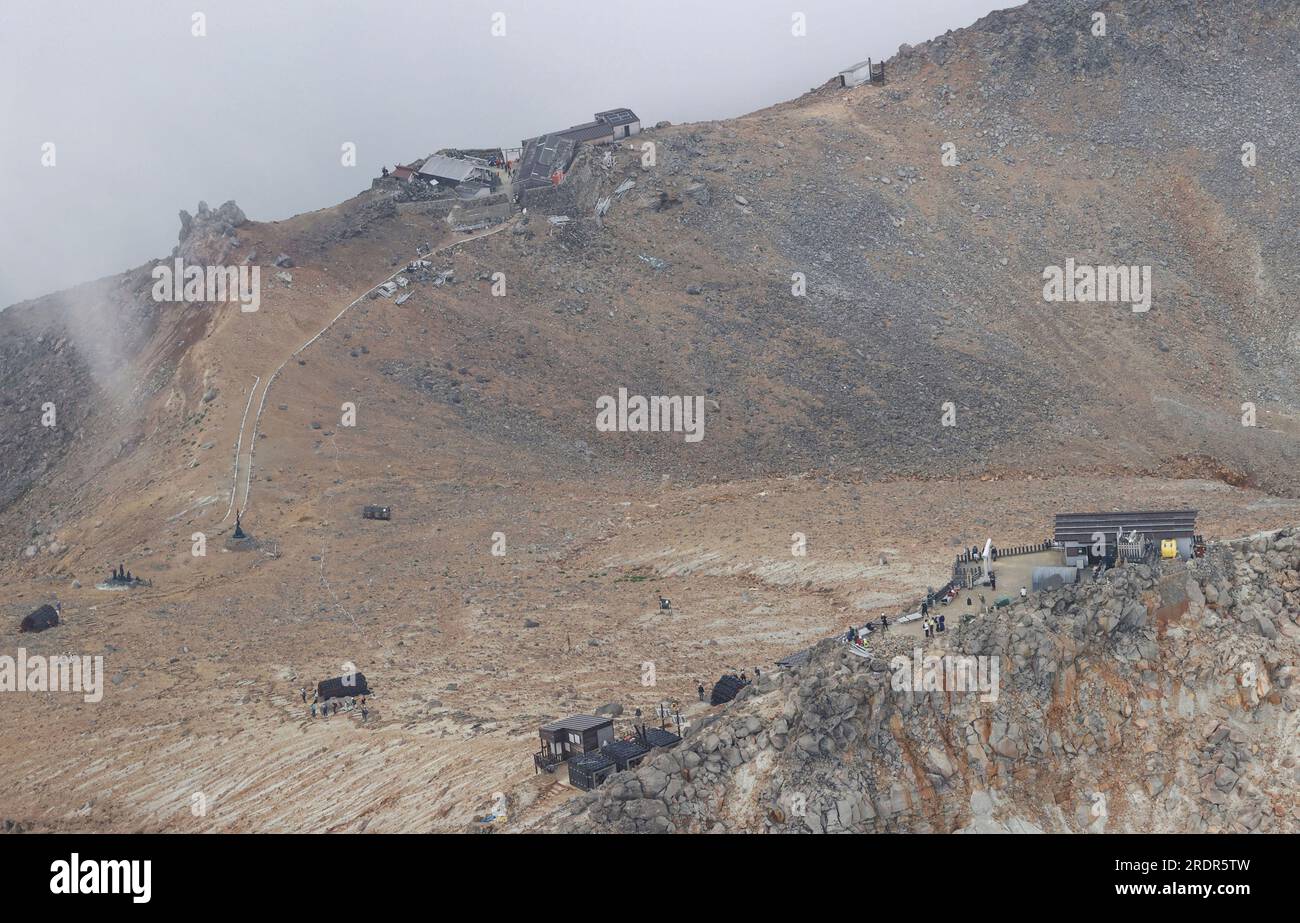 Bereaved families climb Mount Ontake (3067m) to console the spirits of ...