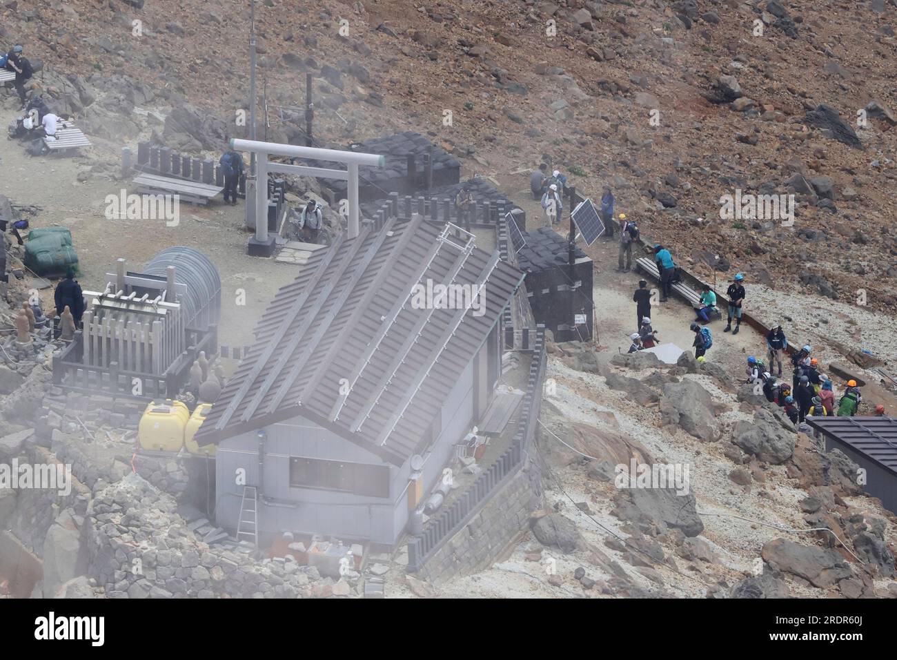 Bereaved families climb Mount Ontake (3067m) to console the spirits of ...