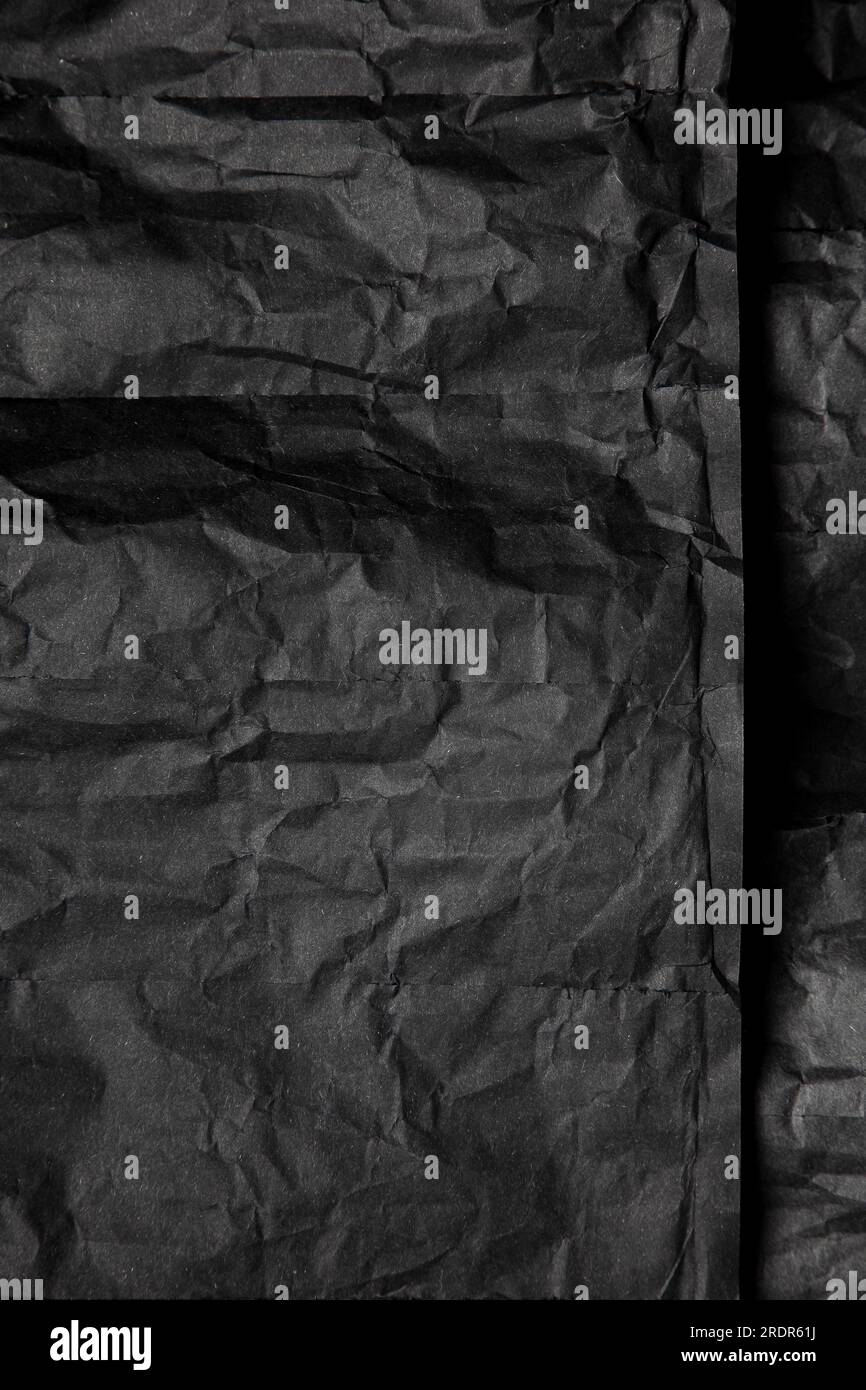 Texture of black crumpled paper. Dark paper background with chaotic ...