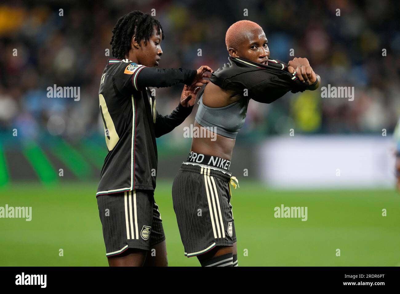 Jamaica's Atlanta Primus, left, assists Jamaica's Deneisha Blackwood ...