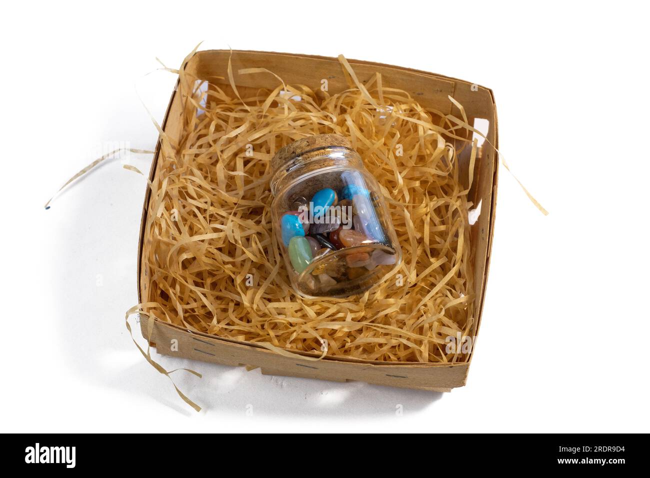 Collection Of Semi-Precious Gemstones on white textured board ...