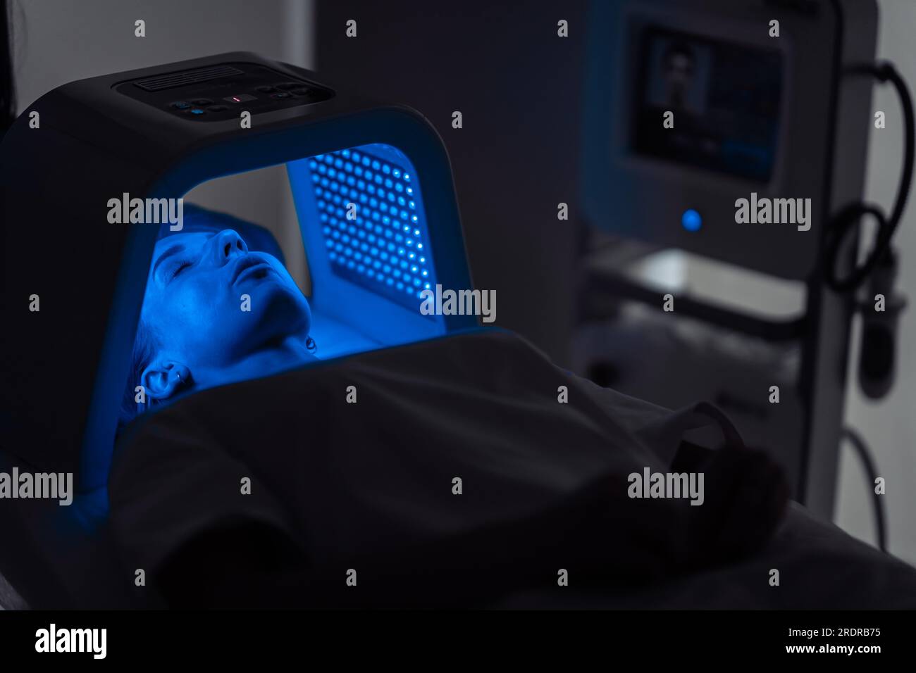 Facial skin care using an LED lamp Stock Photo - Alamy