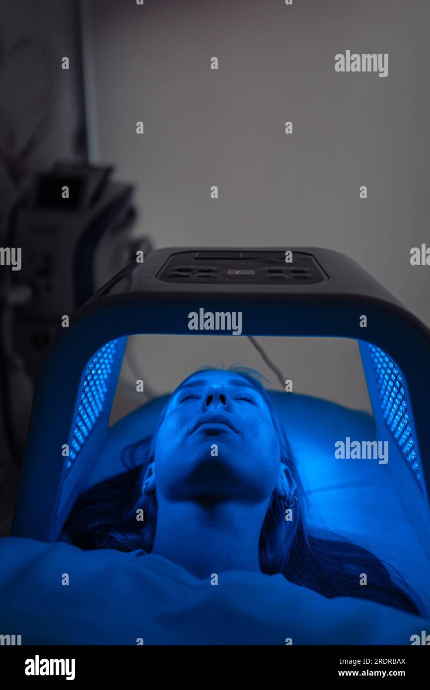 Facial skin care using an LED lamp Stock Photo - Alamy