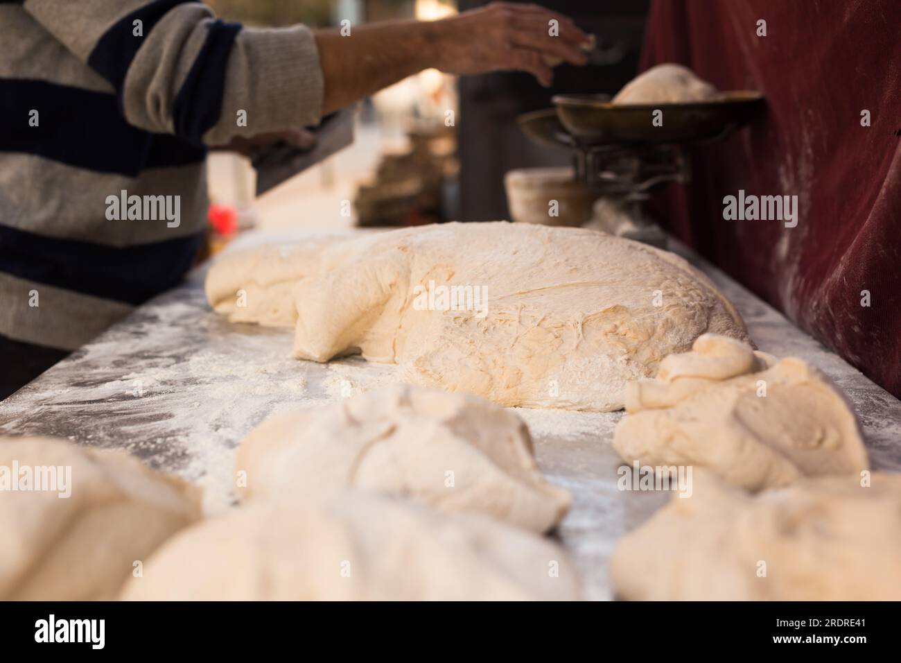 Yeast dough on baking table. cooking process Stock Photo - Alamy