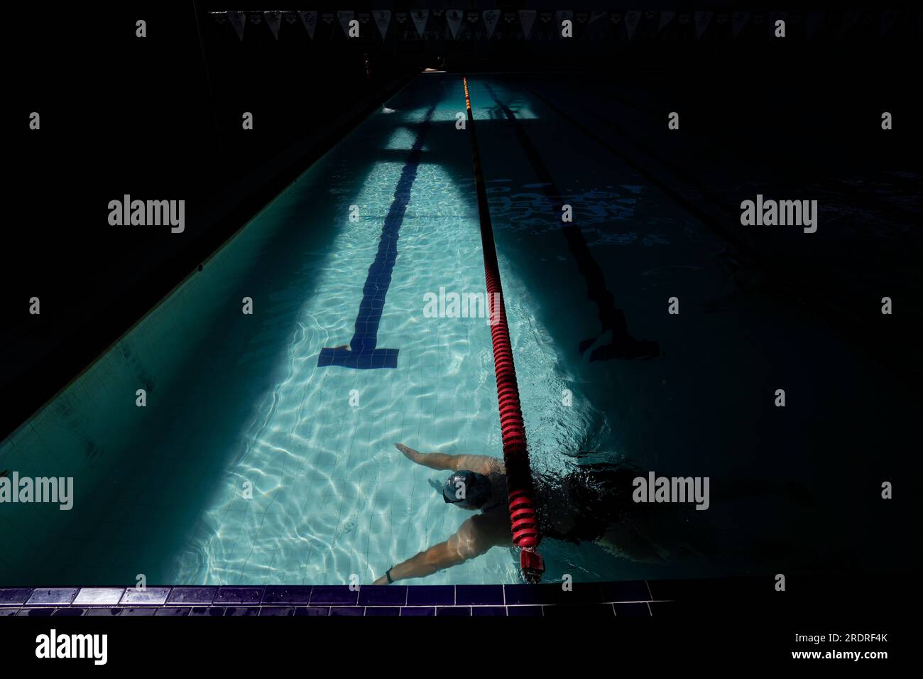 Elizabeth Lopez changes lanes as she swims at a public pool July 20 ...