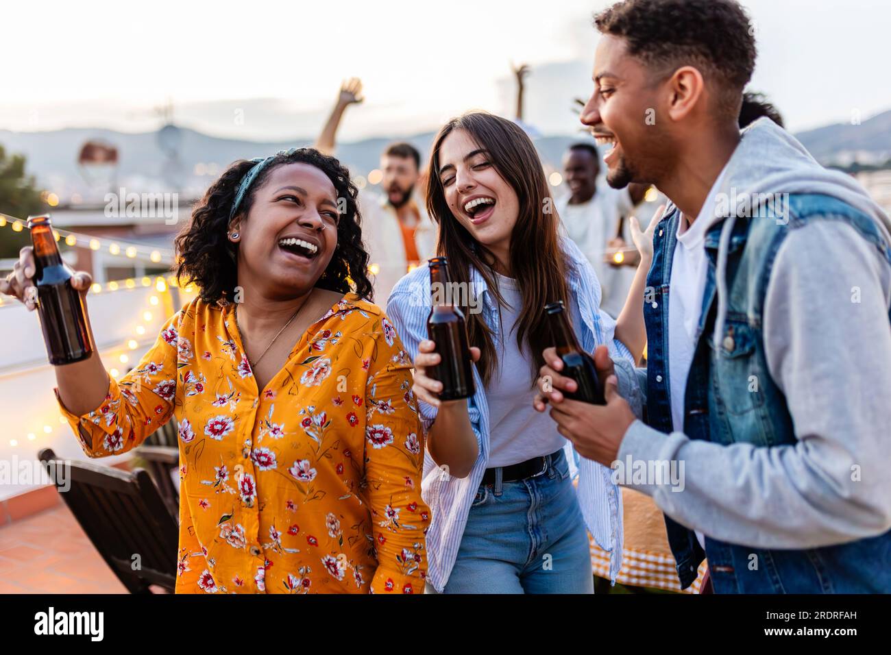 Adult friends dancing roof hi-res stock photography and images - Alamy