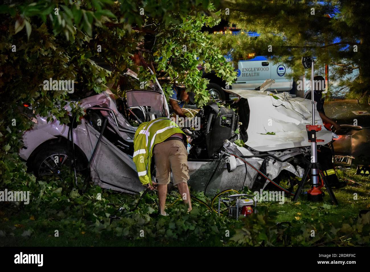 Firefighters and police officers check for any survivors after a ...
