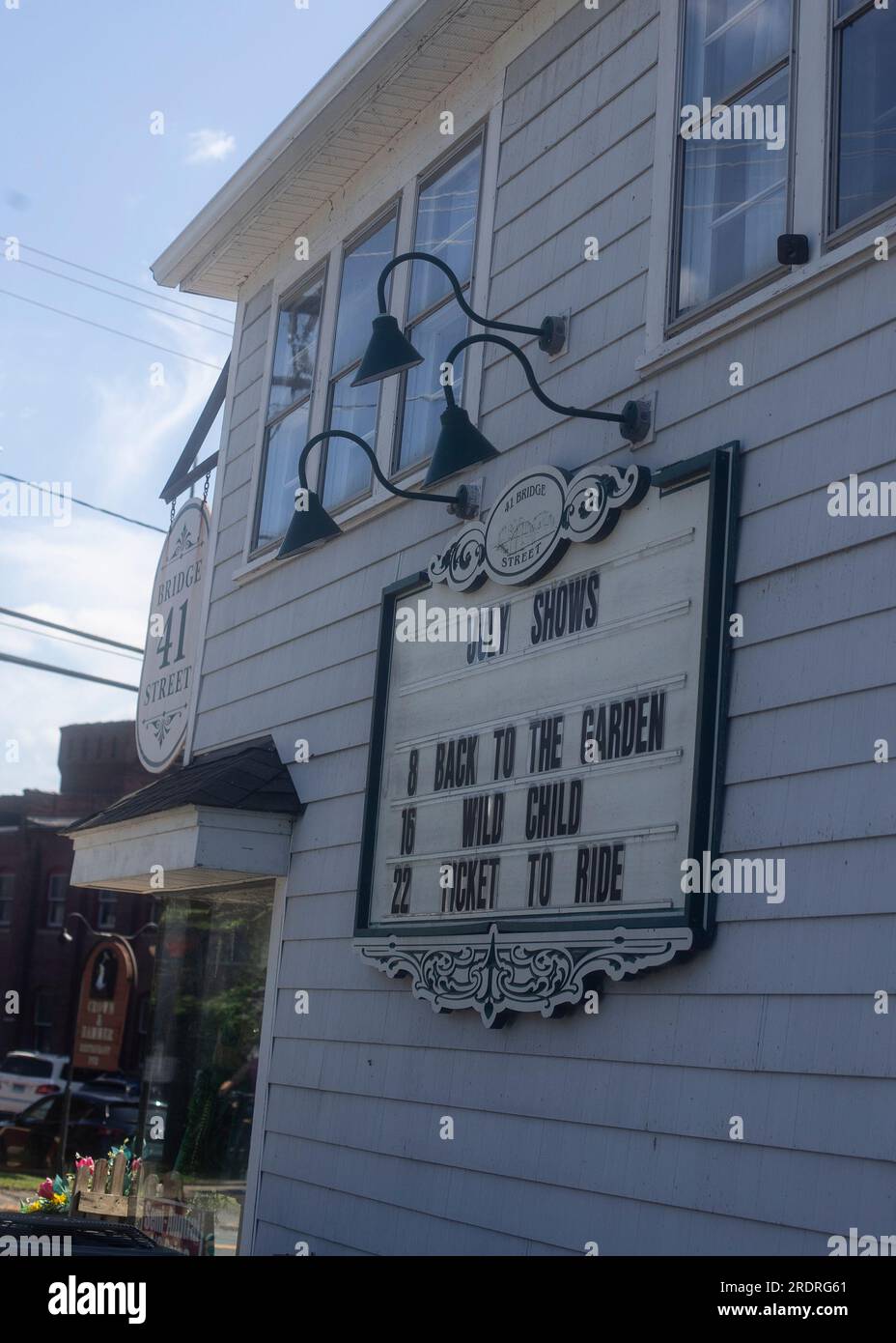 A sign showing bands appearing at a club Stock Photo - Alamy