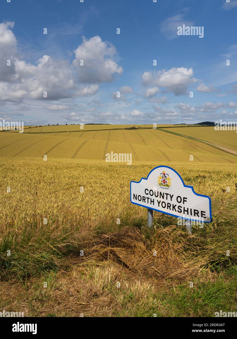 North Yorkshire boundary signpost and corn fields at Burdale near ...