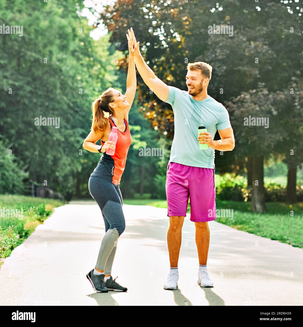 fitness woman park exercise lifestyle outdoor sport healthy couple ...