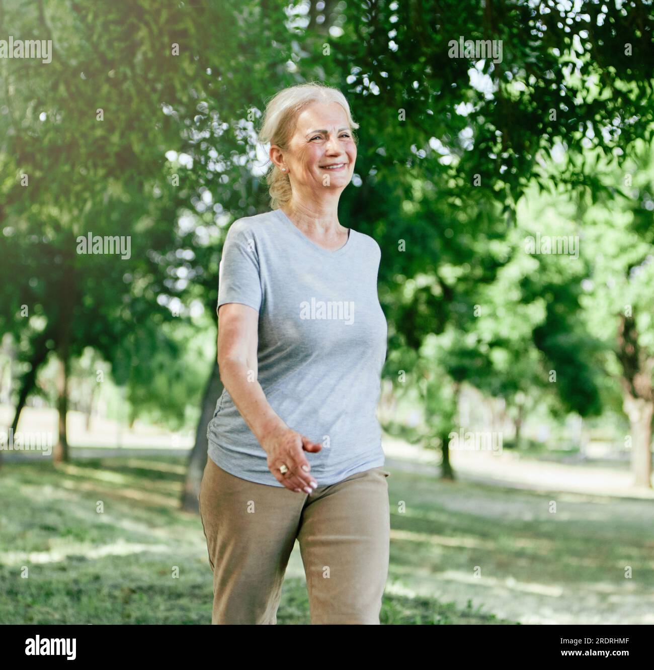 outdoor senior fitness woman lifestyle active sport exercise healthy fit elderly mature running ...