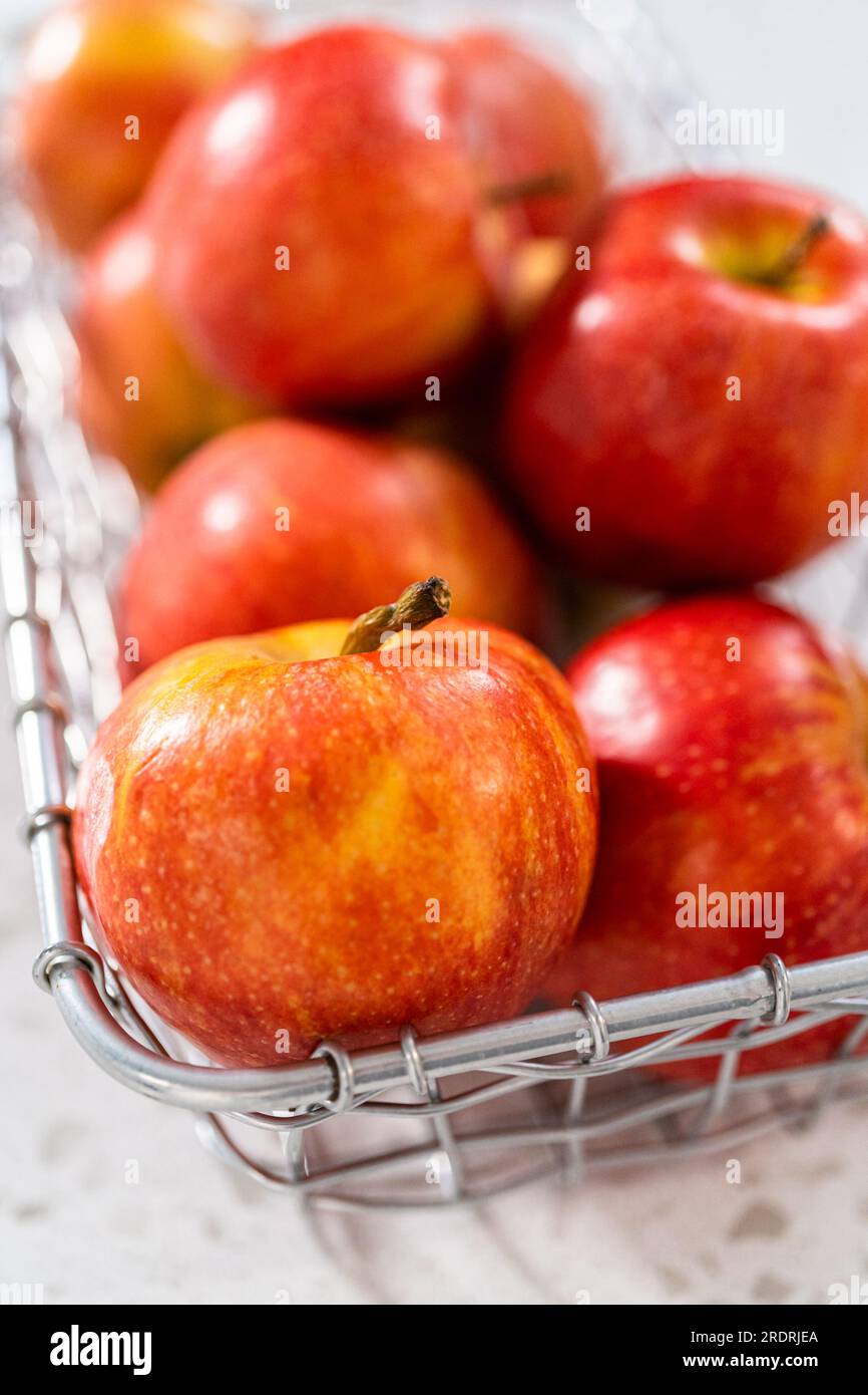 Red apples in the basket Stock Photo - Alamy