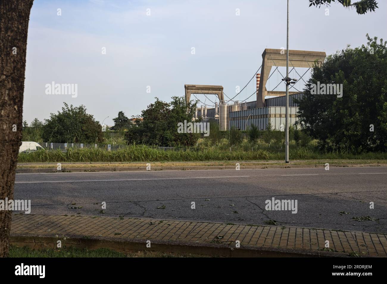 Industrial complex in the italian countryside at sunset seen from a ...